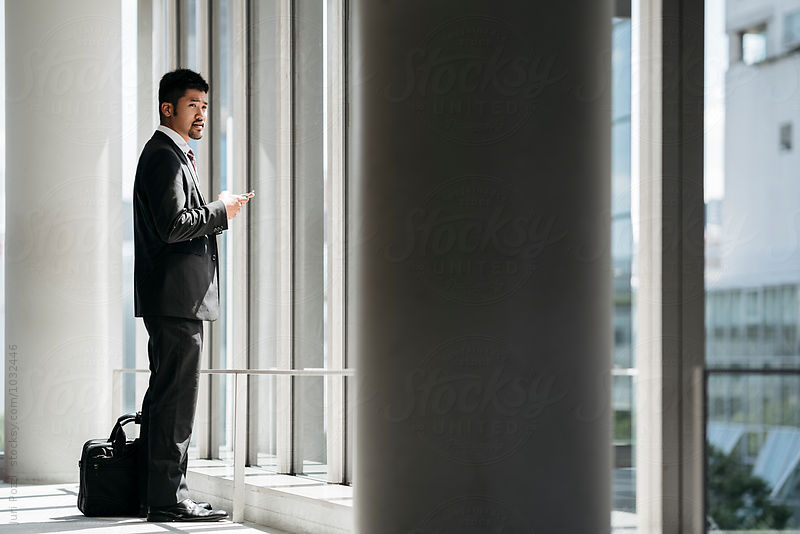 Japanese business man waiting in the office building - Credit Simple NZ